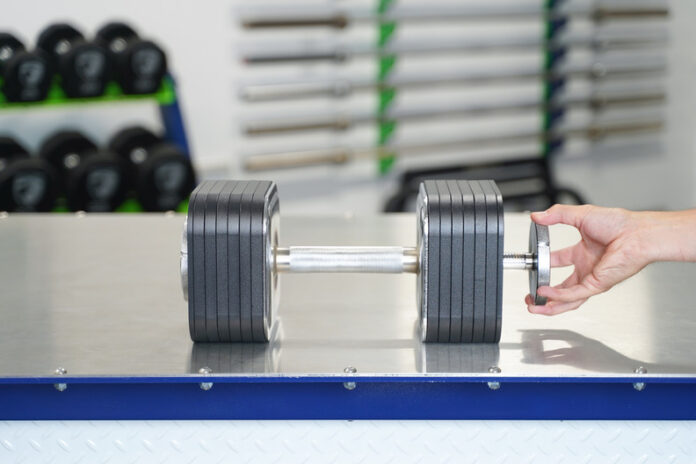 How Do Adjustable Dumbbells Work? | Garage Gym Lab